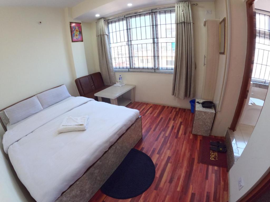 Hotel Global Village | Cozy Stays with a Global Touch - ROAMWINGS.COM